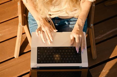 Premium Photo Top View Of Female Hands Over Keyboard Of Laptop