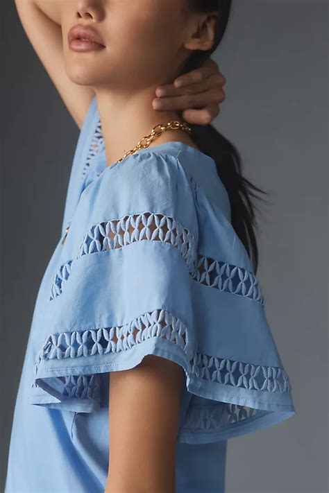 self contrast flutter sleeve cutwork top anthropologie