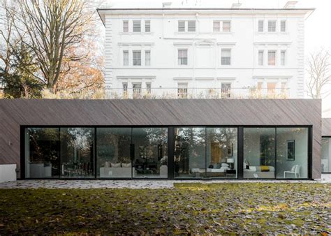 10 Parasitic Dwellings That Cling To Other Buildings