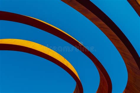 Abstract View Of Modern Sculptural Architecture With Vibrant Red And Yellow Curves Stock Image