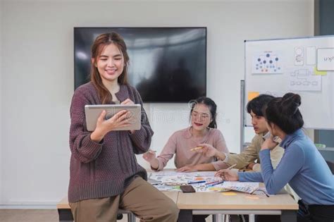 Team Of Ux Developer And Ui Designer Brainstorming Interface Wireframe Designcreative Digital