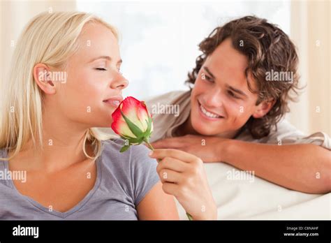 Couple With A Flower Stock Photo Alamy