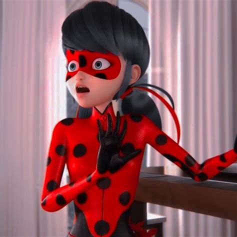 The Animated Ladybug Girl Is Wearing Red And Black