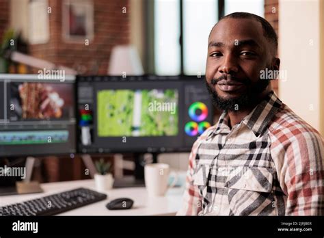 Portrait Of Freelancer Working On Video Editing Software To Make Film Montage Creating Movie