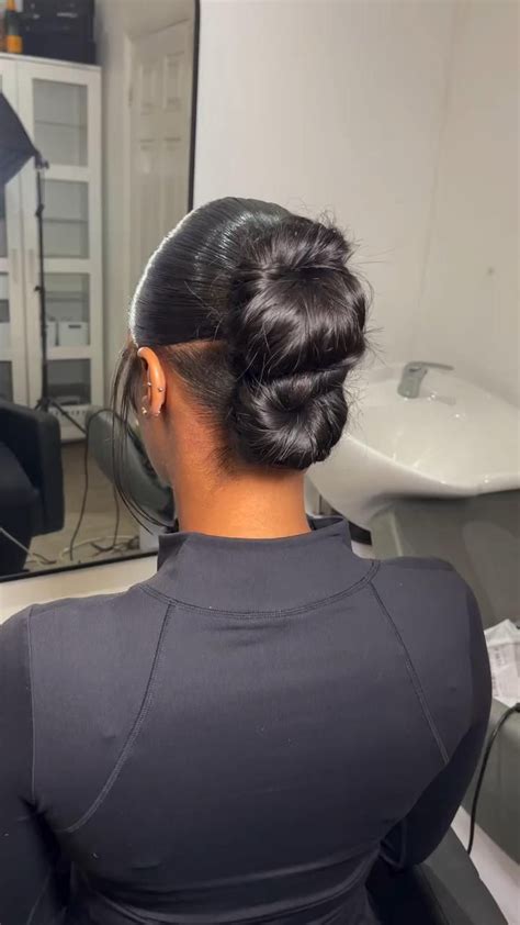 The Double Ponytail Updo Is A Chic And Stylish Hairstyle That Features