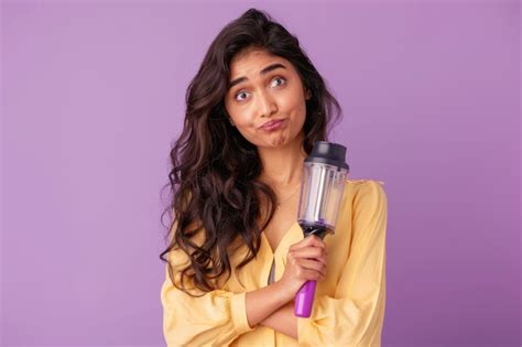 Indian Woman With Hand Blender Confused Expression Premium Ai