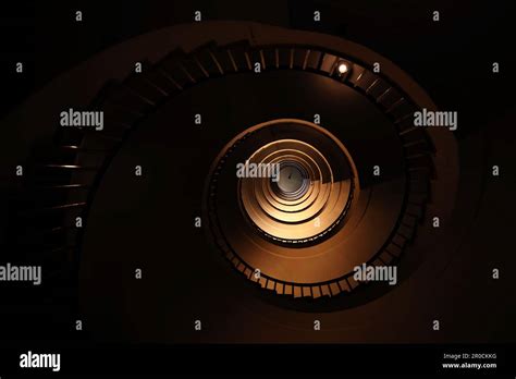 Spiral Staircase In A Tall Multi Floor House In The Form Of A Golden Ratio Architecture