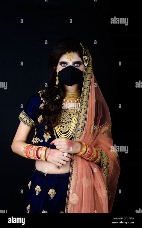 Bride Wearing White Indian Traditional Cloth With Face Mask During