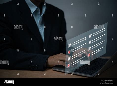 Man Chooses Questionnaire With Checkbox Survey Form Online Answer Questions In The Exam Of