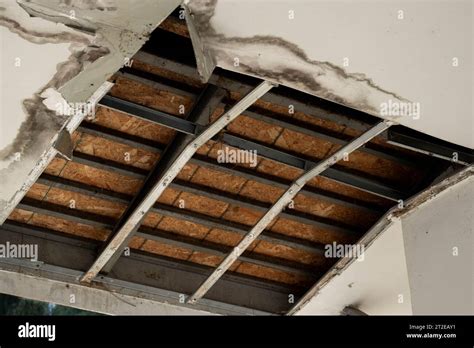Ceiling Panels Had Damaged A Large Hole In The Roof From A Rainwater