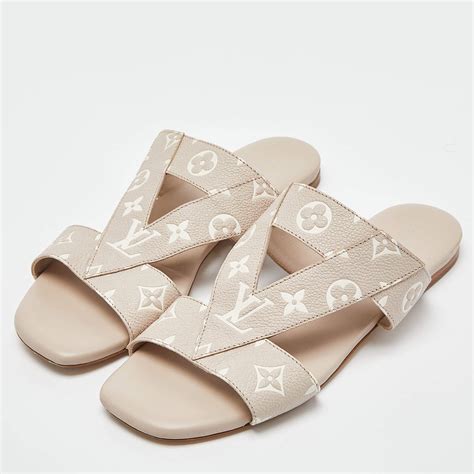 Louis Vuitton Beigewhite Monogram Embossed Leather Flat Slides Size 40
