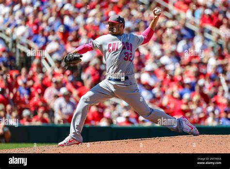 Chicago Cubs Relief Pitcher Brian Duensing Delivers During The Seventh Inning Of A Baseball Game