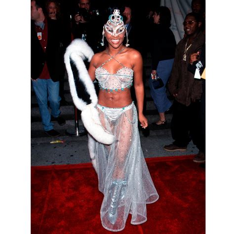 Lil Kims Most Outrageous Outfits Essence