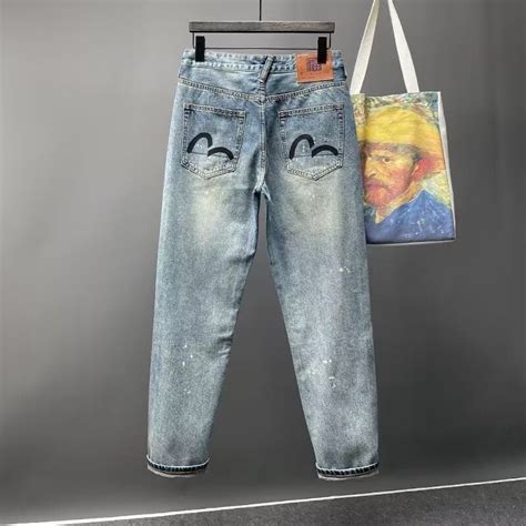 Джинсы Evisu - купить с доставкой по выгодным ценам в интернет-магазине ...