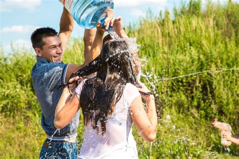 Premium Photo | Children playing water battle water game battle