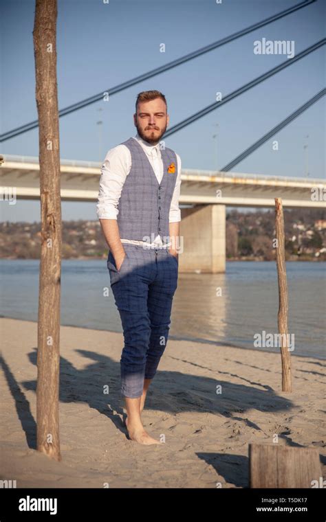 One Young Man Lifestyle Photos On Beach Wearing Suit Barefoot Stock