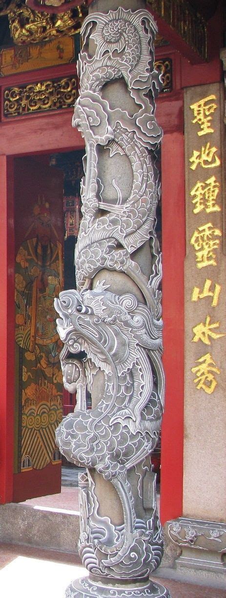 A Beautifully Sculpted Pillar At The Entrance To An Old Chinese Temple