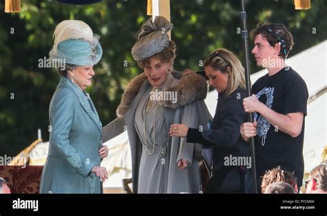 Cast Members On The Set Of The New Downton Abbey Film Featuring Dame