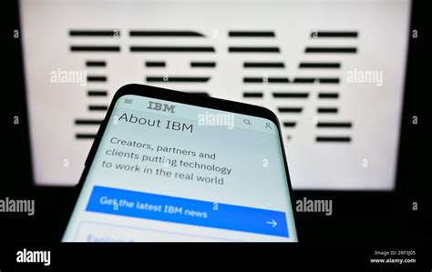 Mobile Phone With Webpage Of International Business Machines