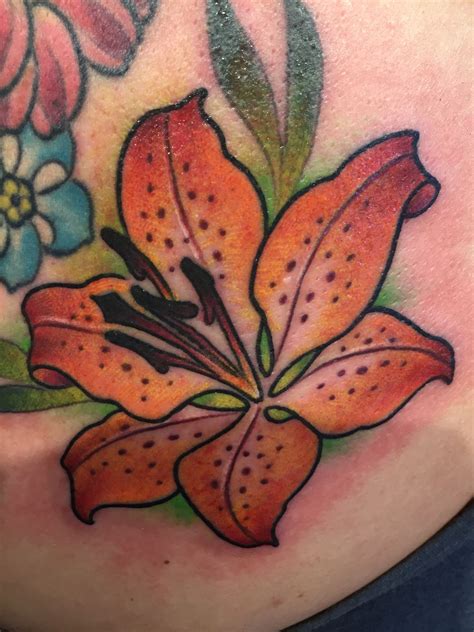 25 Tiger Lily Tattoo Ideas For Women And Men Bold Floral Designs