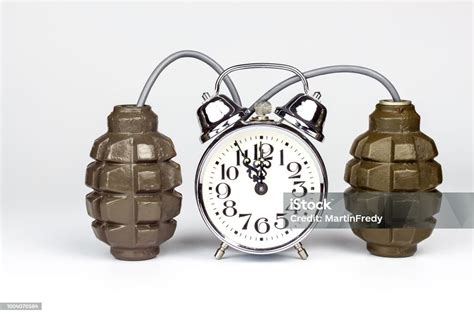 Timed Bomb Old Alarm Clock With A Bomb Danger Of Explosion The Concept