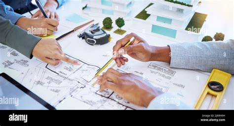 Architect Hands Working On Architecture Design Blueprint Or Floor Plan Engineering With Paper