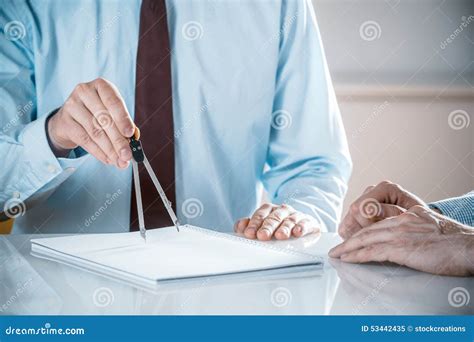 Male Engineer Measuring With A Compass Tool Stock Image Image Of Instrument Plan
