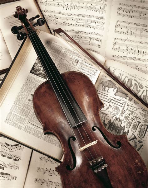 Violin On Music Book Aesthetic Light Light In The Dark Dark Aesthetic