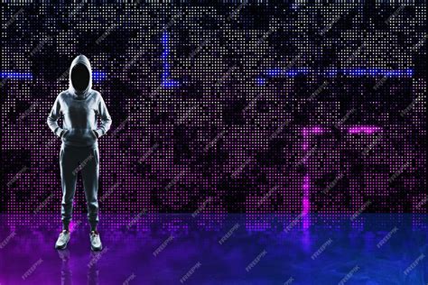 Premium Photo Hacker In Hoodie Standing On Abstract Glowing Pixel Wall Background Large Led Premium Photo Hacker In Hoodie Standing On Abstract Glowing Pixel Wall Background Large Led