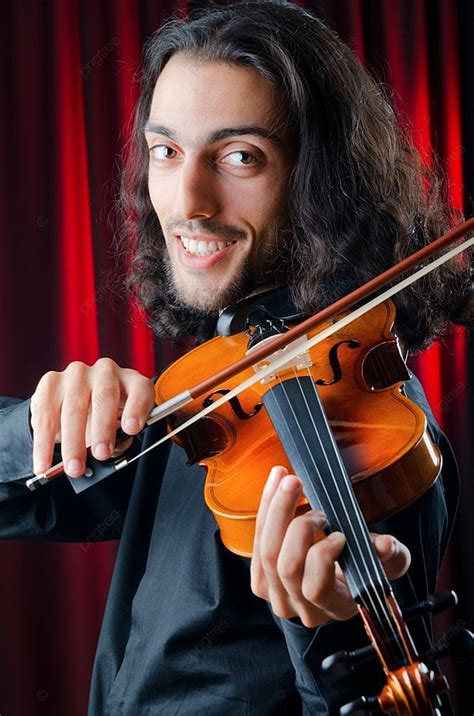 Violin Player Playing The Intstrument Background And Picture For Free Download Pngtree