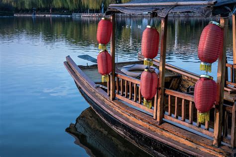 Traditional Chinese Boat Docked On The Lake Photograph By Camera