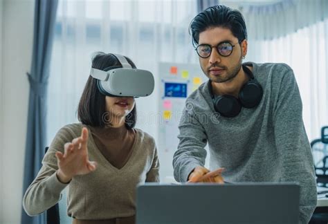 Asian And Indian Developer Program Coding Sent To Virtual Reality Headset To Implement Ai