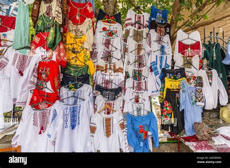 Souvenir shop with traditional shirts on Andriyivskyy Descent and view ...