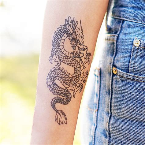 Small Dragon And Flower Tattoo