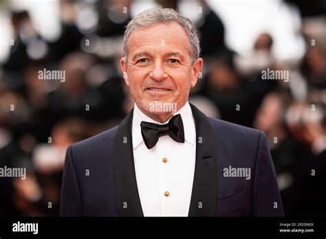 Bob Iger Poses For Photographers Upon Arrival At The Premiere Of The Film Indiana Jones And The