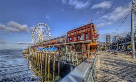 Pier 57 The Seattle Great Wheel And Attractions On Pier 57 Flickr