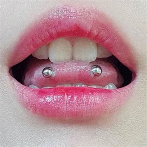 Tongue Piercing Snake Eyes