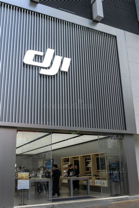 Dji Logo On The Shop Front In Shenzhen China Editorial Stock Image Image Of Design Store