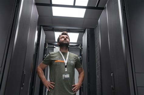 Premium Photo Portrait Of Male Technician Or Network Administrator Standing Brave As A Hero