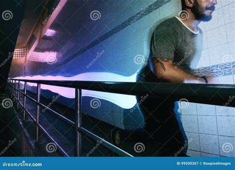 Man In A Running Movement With Long Exposure Light At His Back Stock Image Image Of