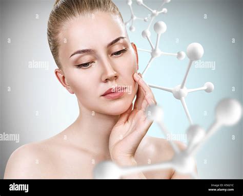 Beautiful Young Woman With Big White Molecule Chain Over Gray Background Innovation Cosmetics