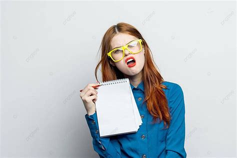 Female Secretary In Yellow Glasses Working With Official Notepad Photo Background And Picture