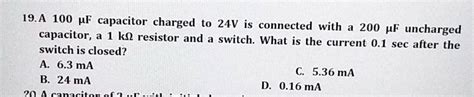 Solved 19 A 100 Uf Capacitor Charged To 24v Is Connected With A 200 Uf Uncharged Capacitor A