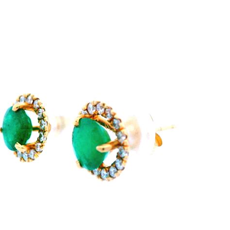 Contemporary 14k Yellow Gold Emerald And Diamond Halo Earrings For Sale