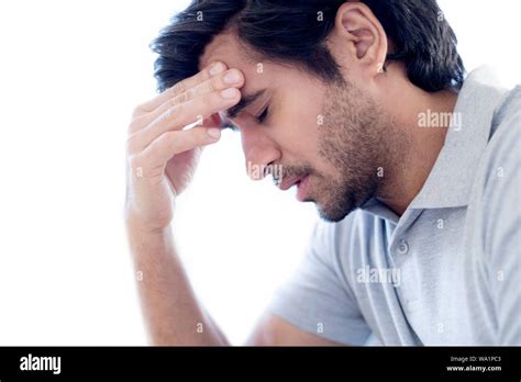 Stressed Man Holding Forehead Hi Res Stock Photography And Images Alamy