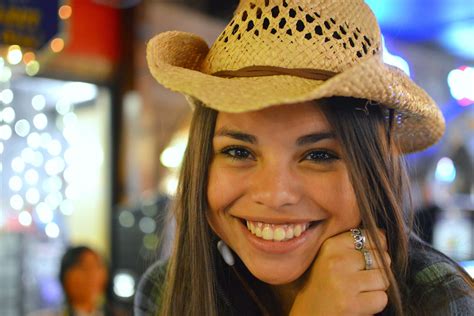 Download Free Amateur Model Posing With Cowboy Hat Wallpaper