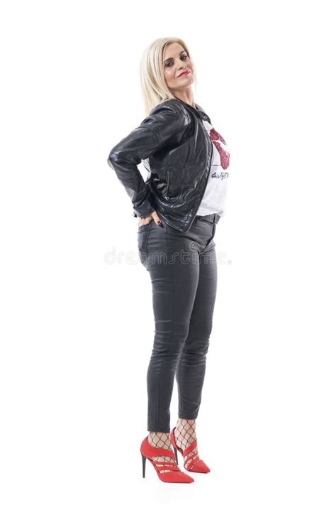 Side View Of Attractive Middle Aged Woman In Stylish Black Leather