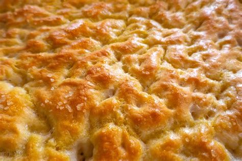 Premium Photo Focaccia A Specialty Of Italian Salted Bread Mixed With
