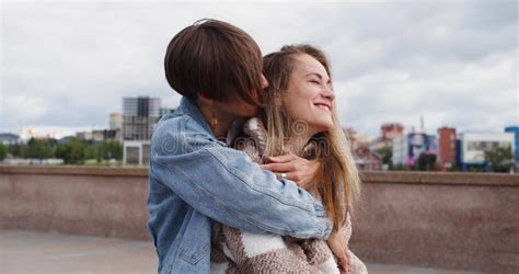 Two Lesbian Women Sit On The Embankment And Enjoy Each Other One Woman