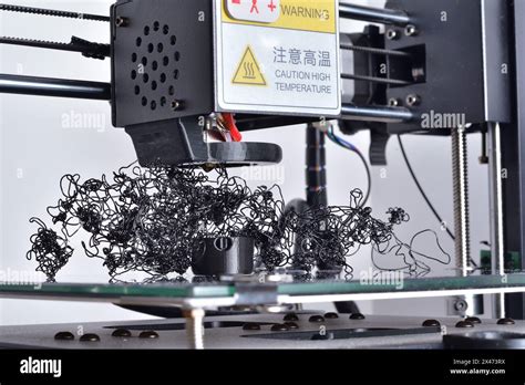 3d printer fail plactic filament extruded randomly curled black pla